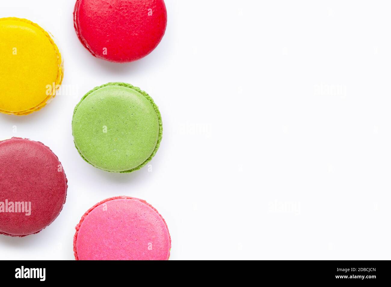 Colorful macarons isolated on white background Stock Photo - Alamy