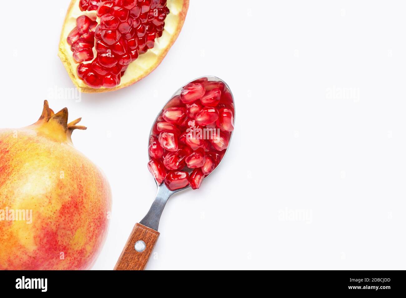 Pomegranate isolated on white background. Top view Stock Photo - Alamy