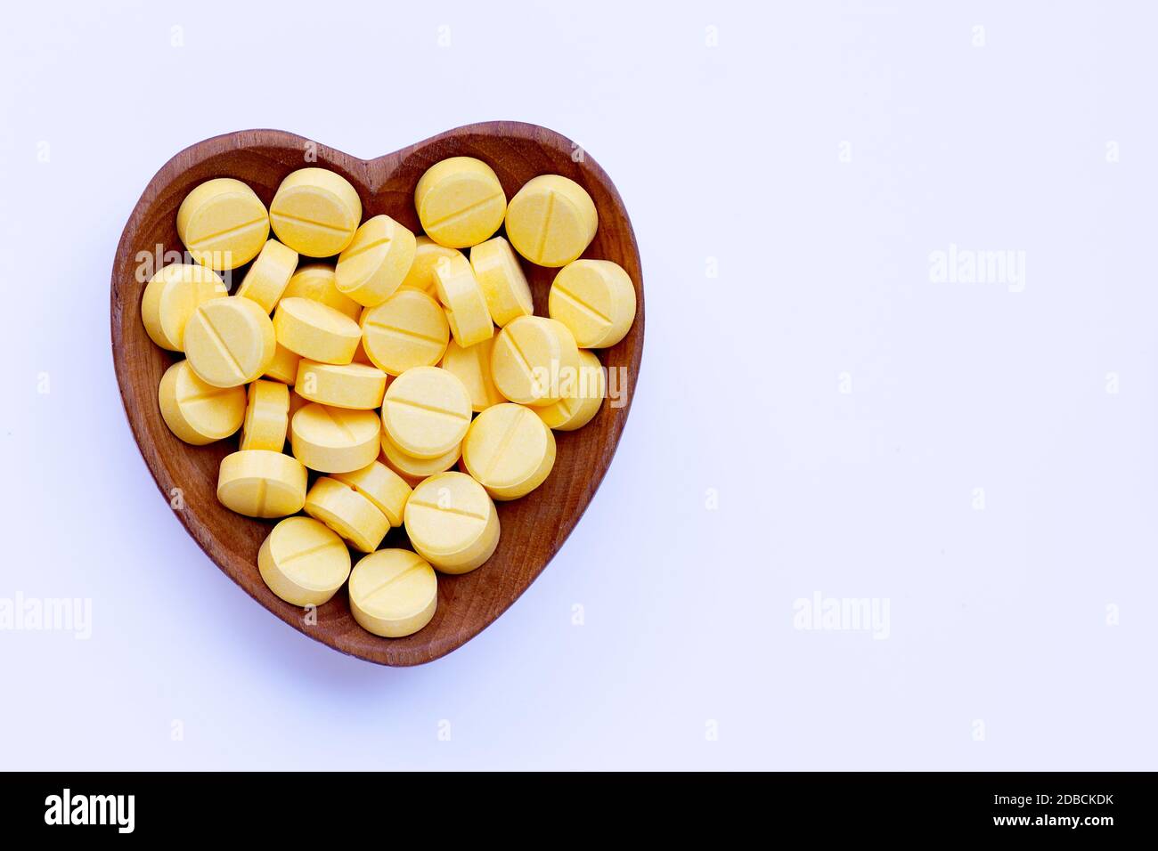 Yellow tablets of Paracetamol on white background Stock Photo - Alamy
