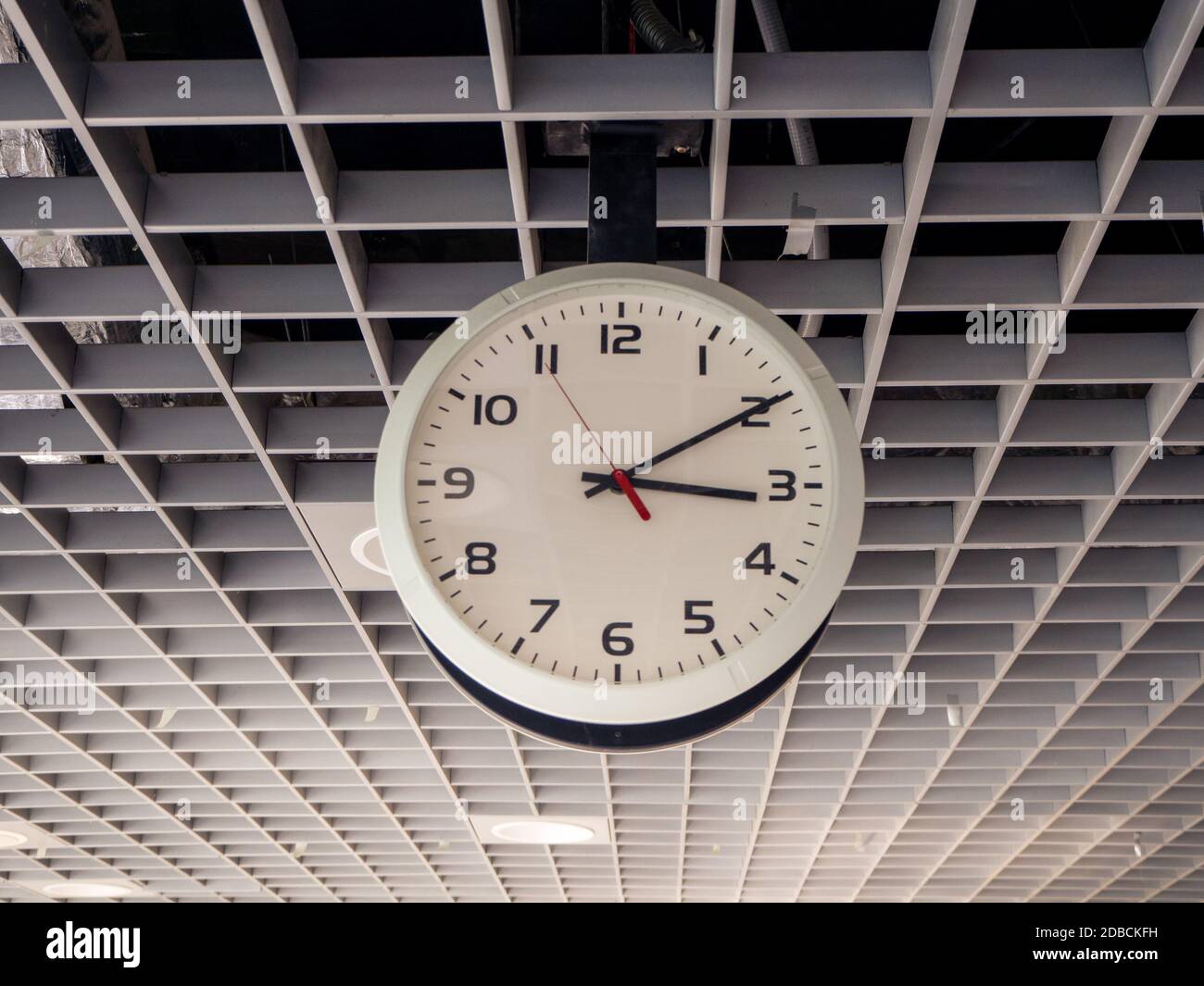 train station clock hanging from the ceiling Stock Photo - Alamy