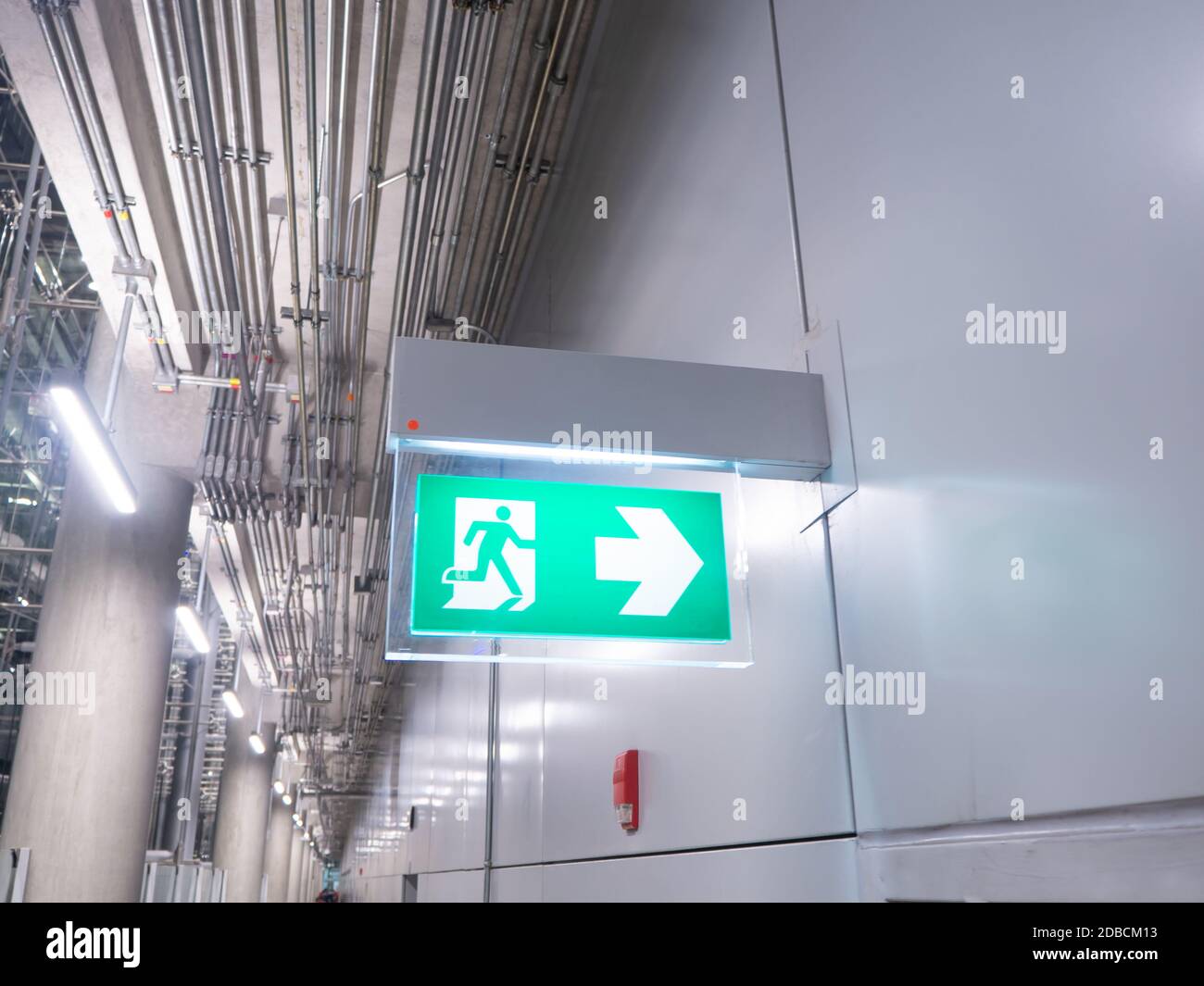 led sign in corridor point way out of resident apartment building, Fire ...