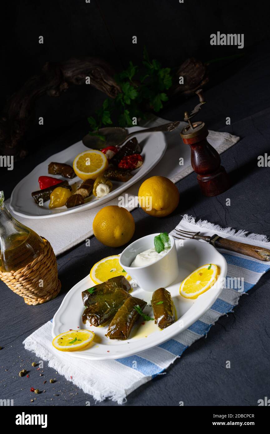 Dolmades - stuffed grape leaves the Greek way Stock Photo - Alamy