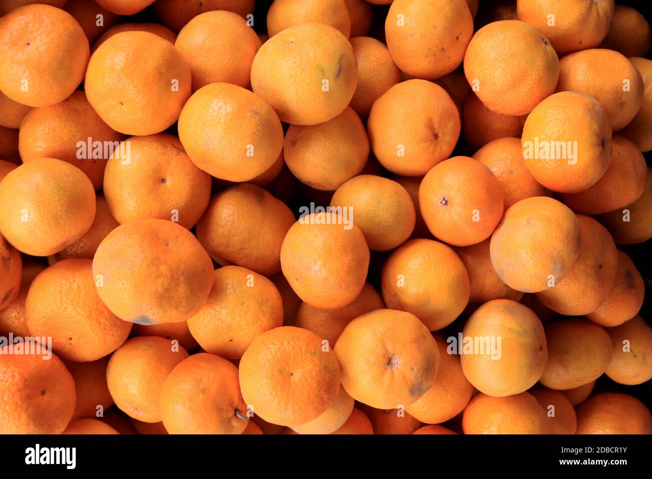 Mandarins background. Tangerines showcase texture Stock Photo - Alamy