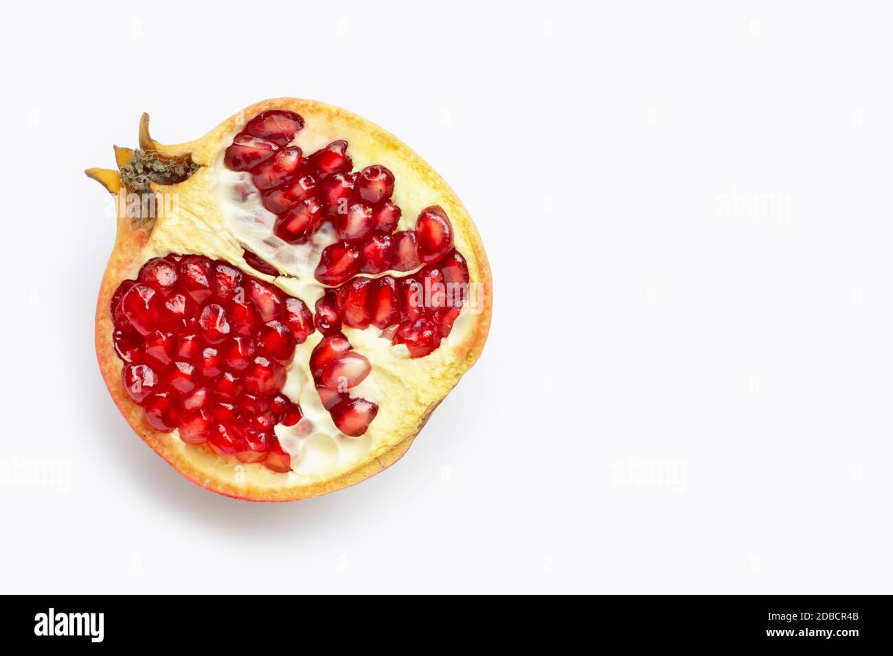 Pomegranate isolated on white background. Top view Stock Photo - Alamy