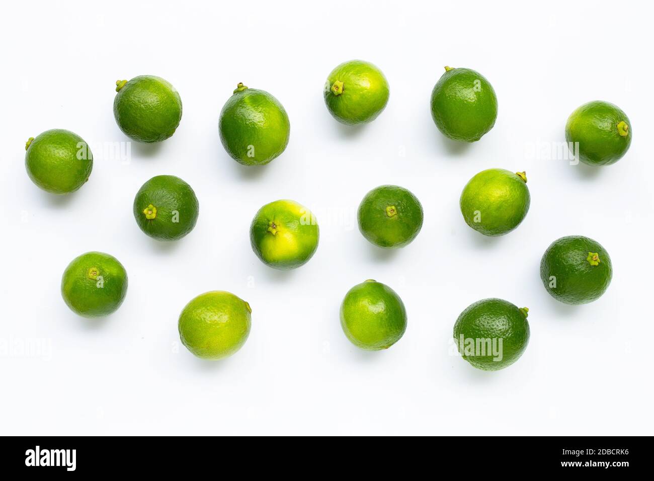 Fresh limes isolated on white background. Top view Stock Photo - Alamy