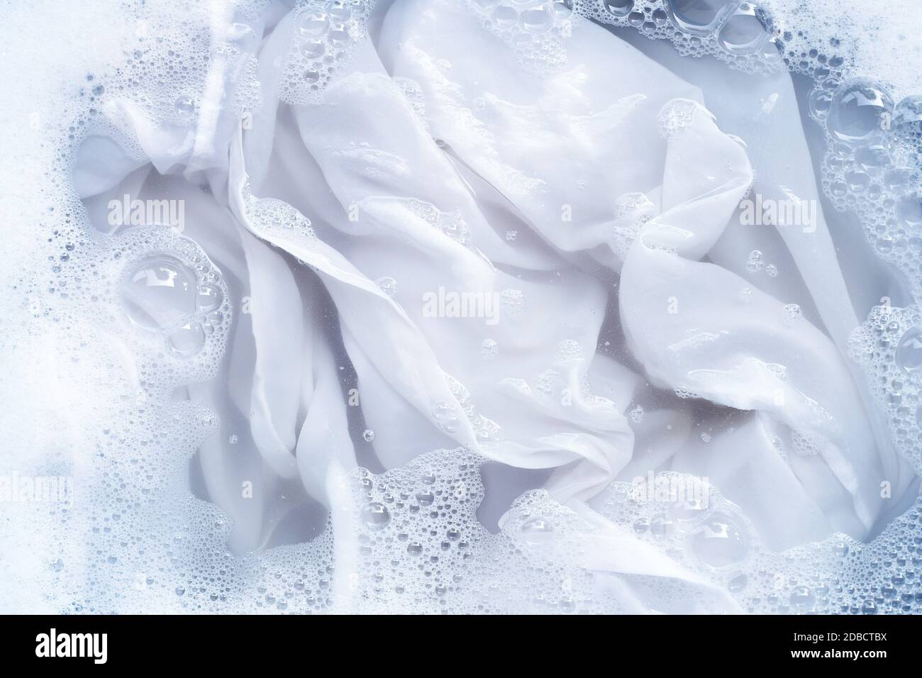 Top view of soak a cloth before washing, white cloth Stock Photo - Alamy