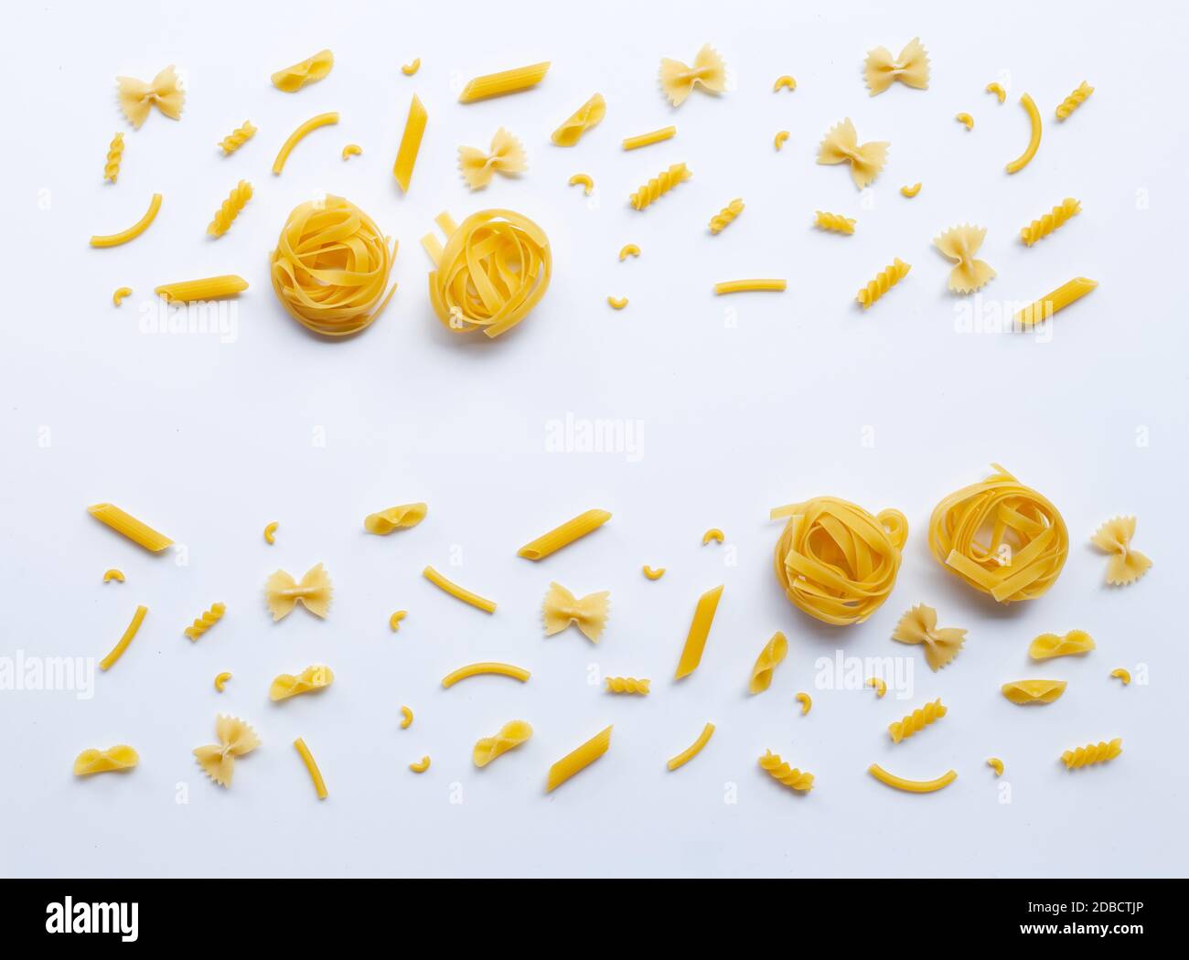 Different types of dry pasta on white background Stock Photo - Alamy