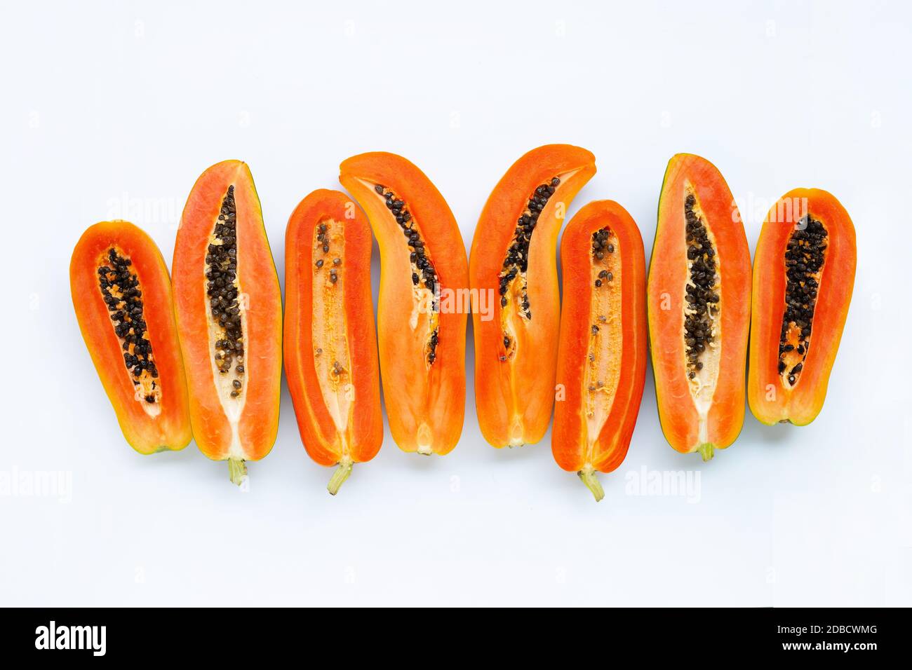 Half of ripe papaya fruit with seeds isolated on white background Stock ...