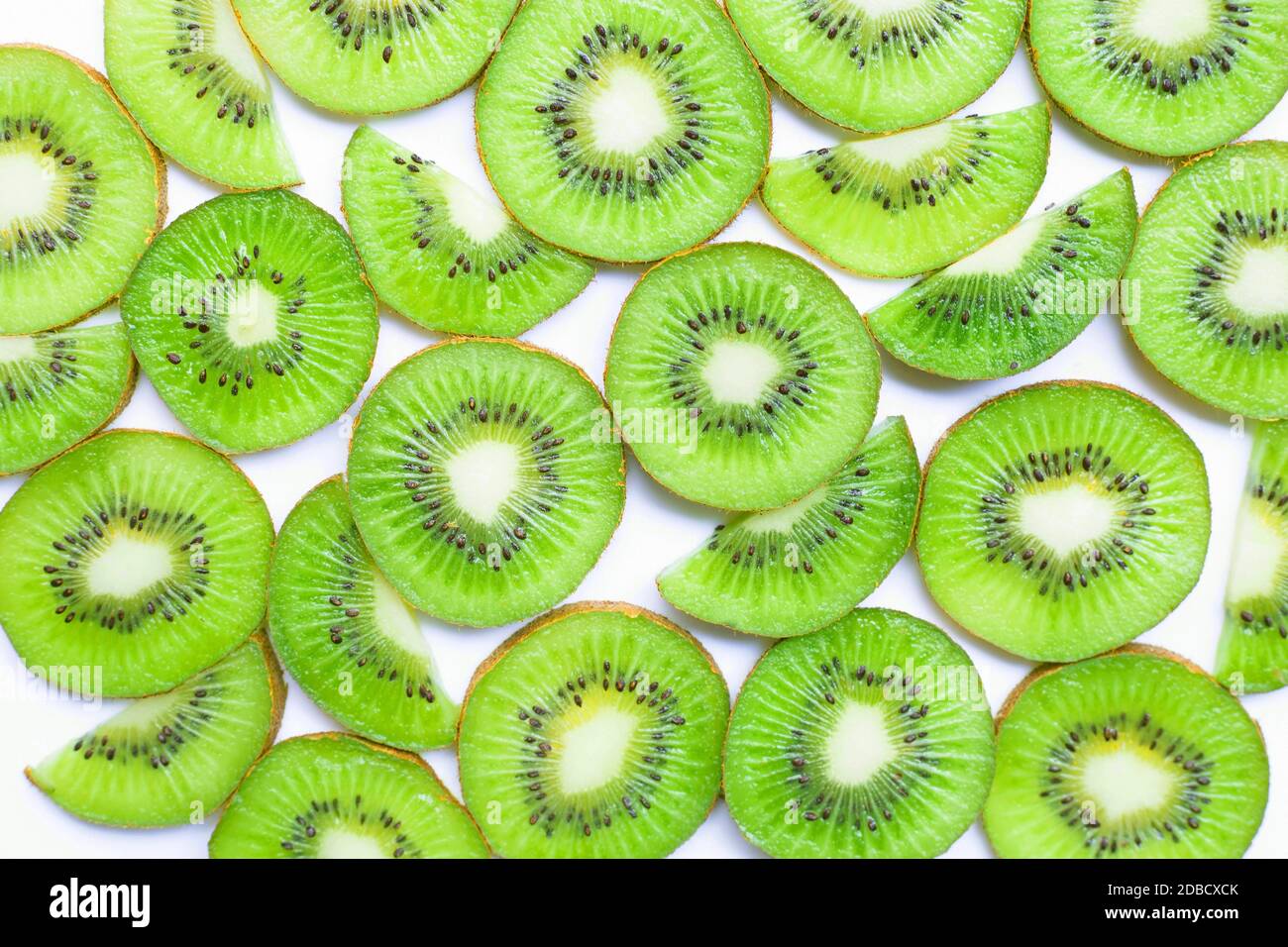 Ripe kiwi fruit slices isolated on white background Stock Photo - Alamy