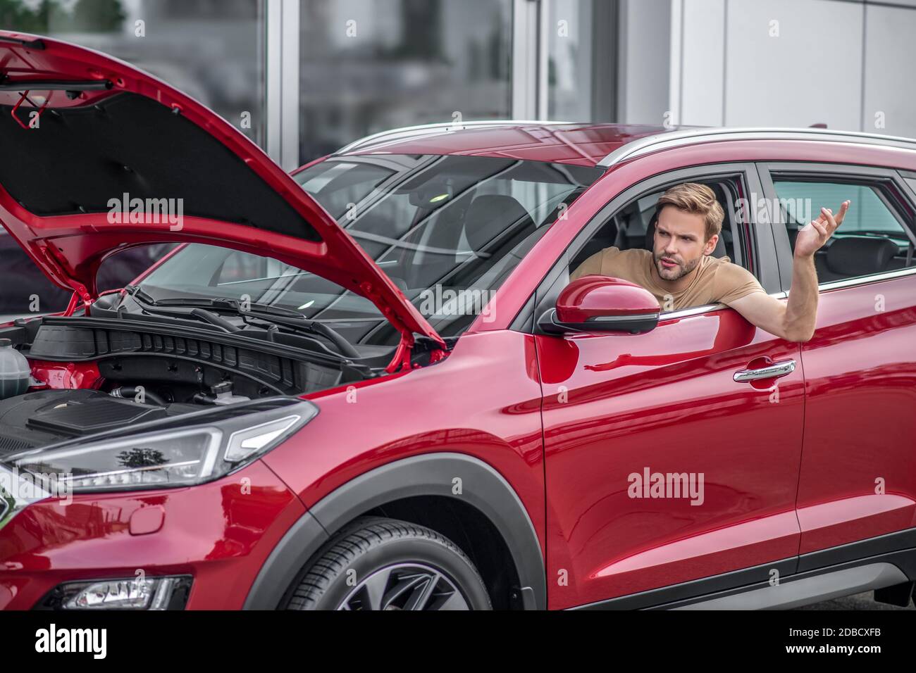 Open car hood while driving hi-res stock photography and images - Alamy
