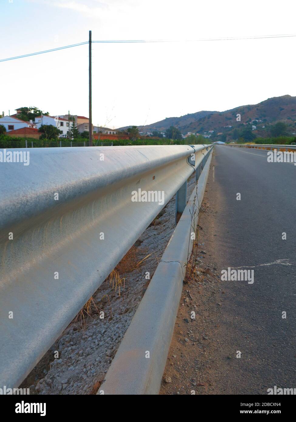 A steel guardrail on a rural roadside with a nice perspective Stock ...