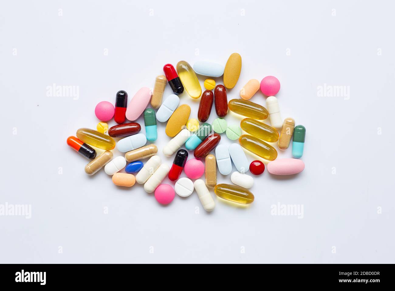 Colorful tablets with capsules and pills on white background Stock ...