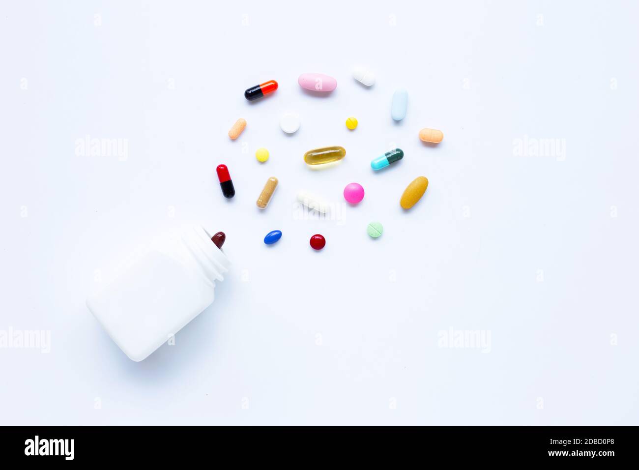 Colorful tablets with capsules and pills on white background Stock ...
