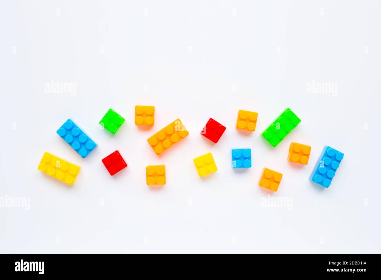 Plastic building blocks isolated on white background. Top view Stock ...