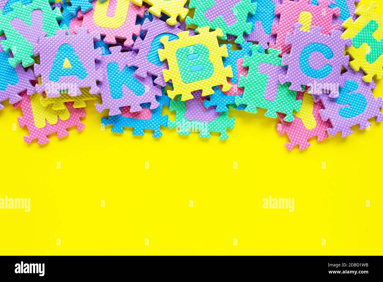 Alphabet puzzle pieces on hi-res stock photography and images - Alamy