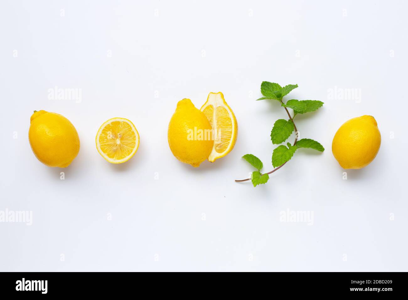 Fresh lemon with leaves isolated on white background Stock Photo - Alamy