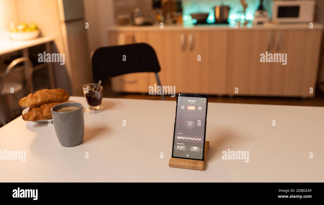 Lighting remote control system on smartphone. Phone with touching ...
