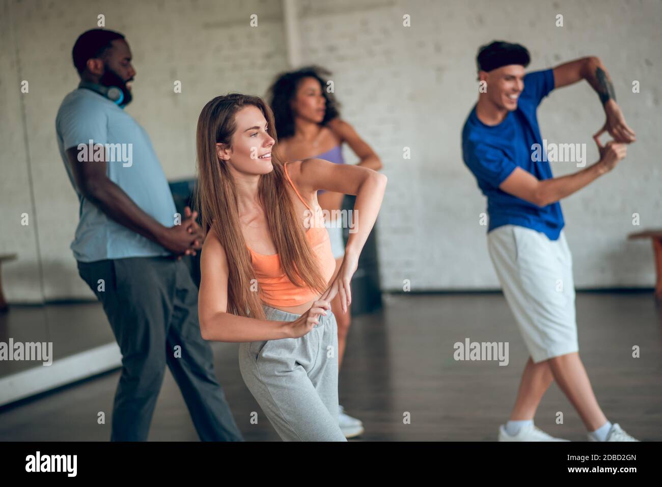Group of people learning new movements during th dance class Stock ...