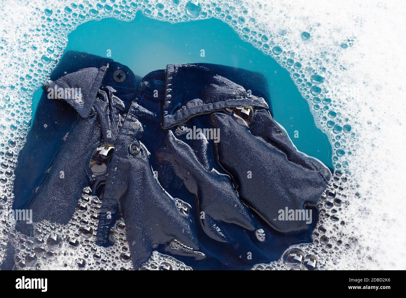 Shirt soak in powder detergent water dissolution, washing cloth ...