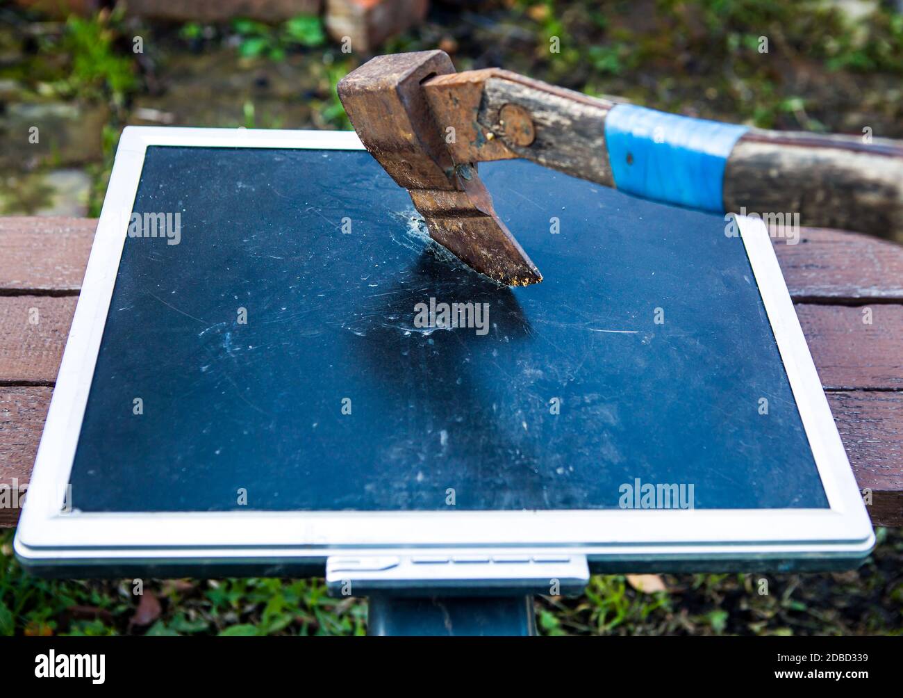 Axe to Smash a Computer Screen Monitor outdoor closeup Stock Photo - Alamy