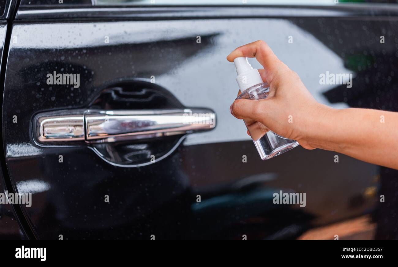 Asian young woman applying press dispenser sanitizer alcohol spray ...