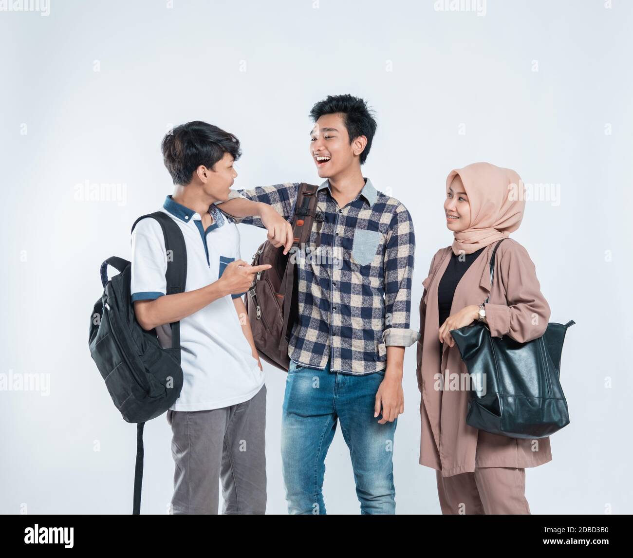 Portrait of conversation college friends carrying a bag and book. asian ...