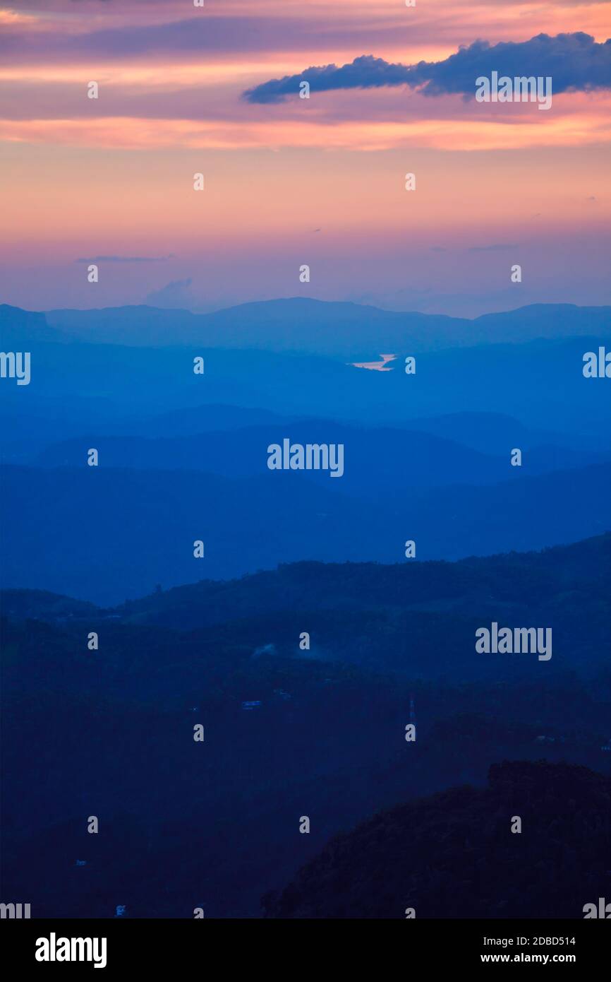 Indian sunset in South India Niligiri mountains in Western Ghats ...