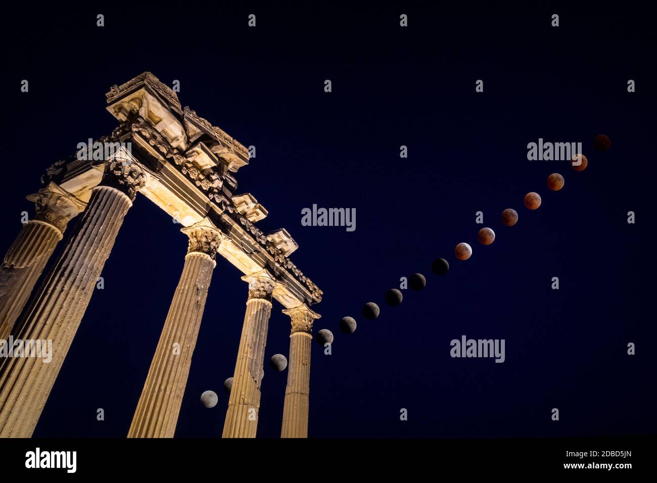 Total Lunar Eclipse over the Apollo Temple in Side, Turkey Stock Photo ...