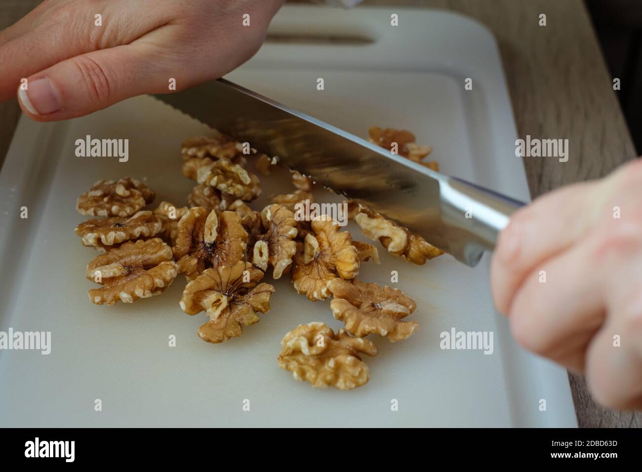 Cutting walnuts hi-res stock photography and images - Alamy