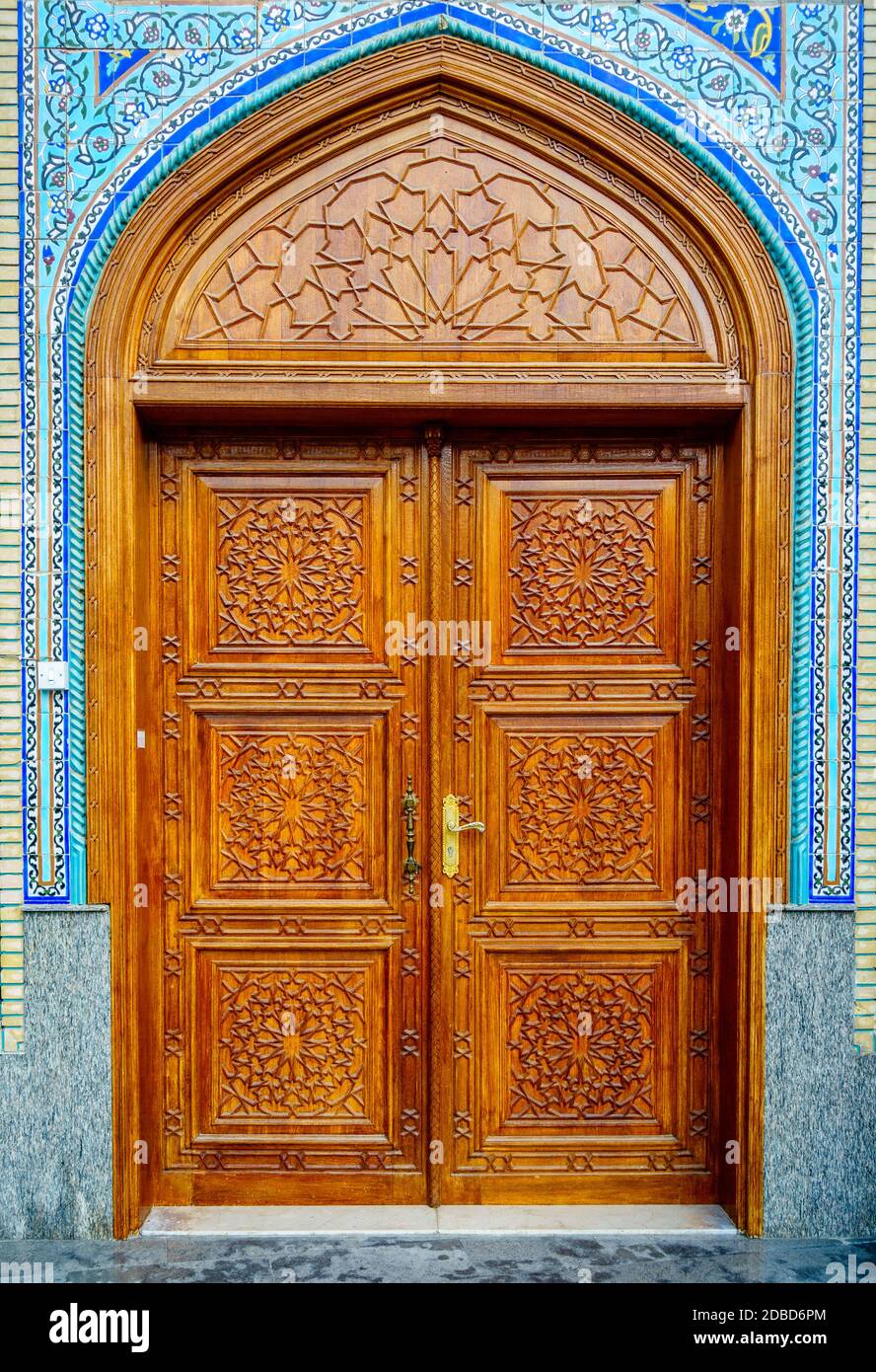 Ornate wooden door on Iranian Mosque in Bur Dubai Stock Photo - Alamy