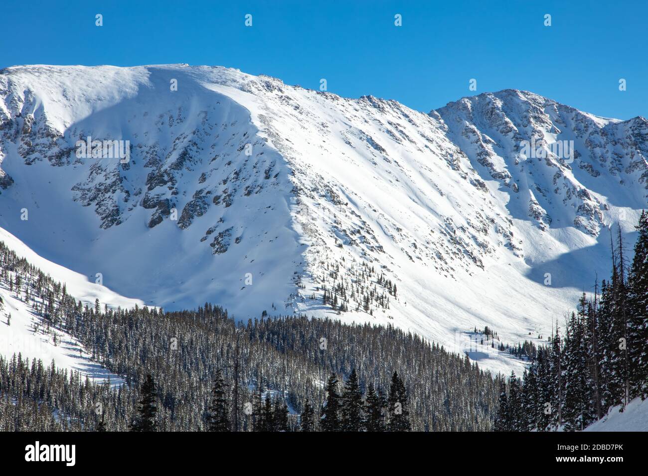 A breathtaking view of the snow covered mountains in Colorado in the ...