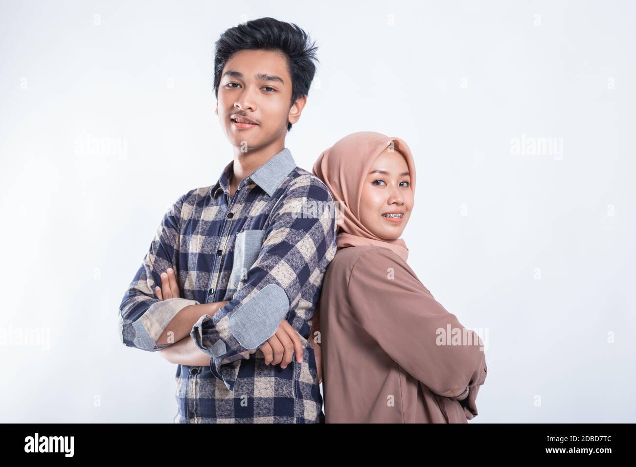 Portrait of Happy College Friends crossed arms on an isolated white ...