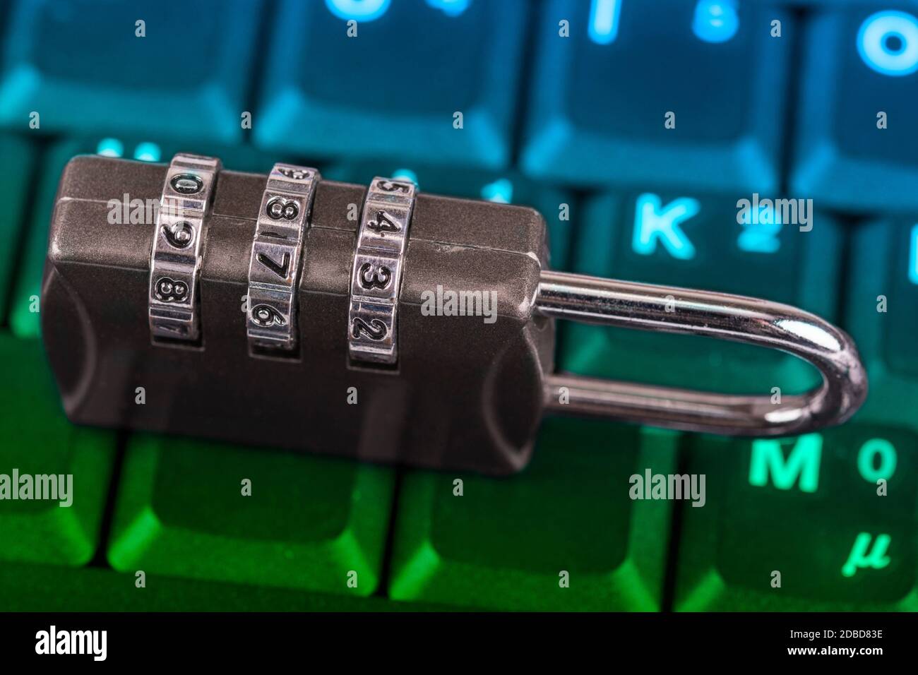 A padlock on a keyboard - symbol foto - save Stock Photo - Alamy