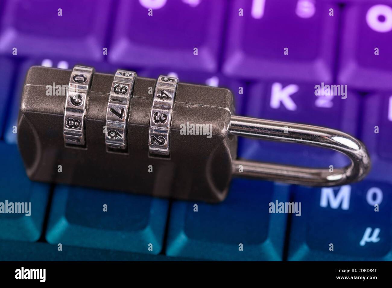 A padlock on a keyboard - symbol foto - save Stock Photo - Alamy