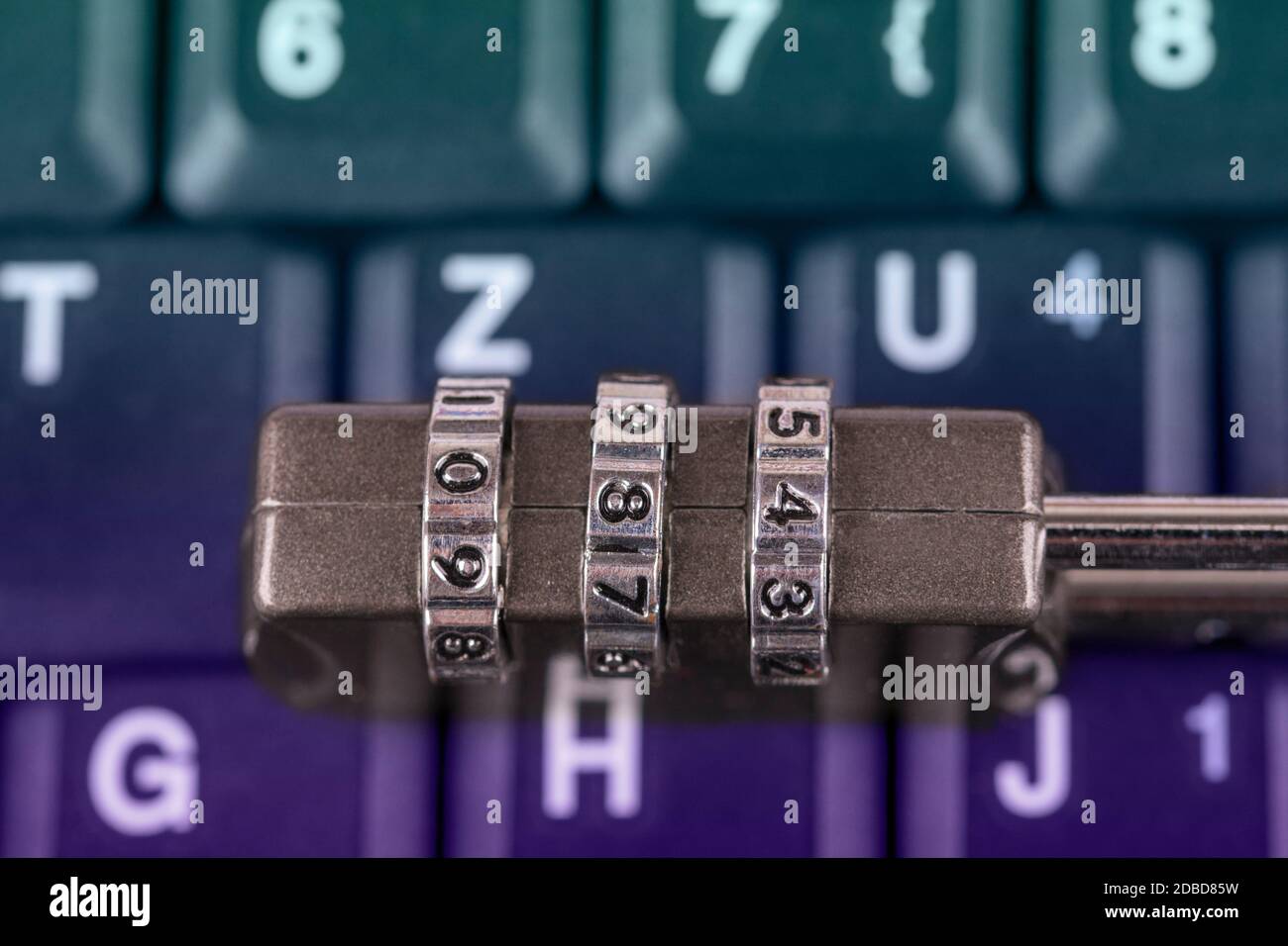 A padlock on a keyboard - symbol foto - save Stock Photo - Alamy