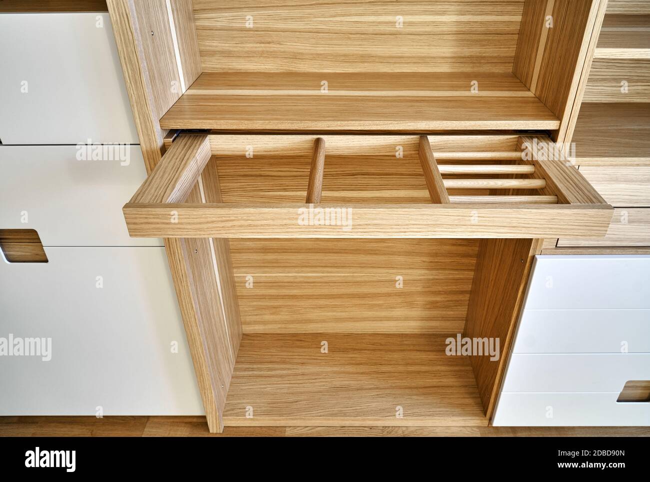 Internal details of the wooden wardrobe with slide out rack for ...