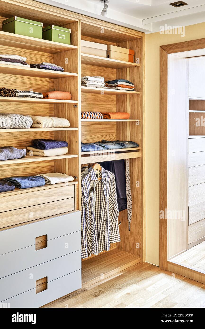 Internal details of the wooden wardrobe with slide out rack for ...