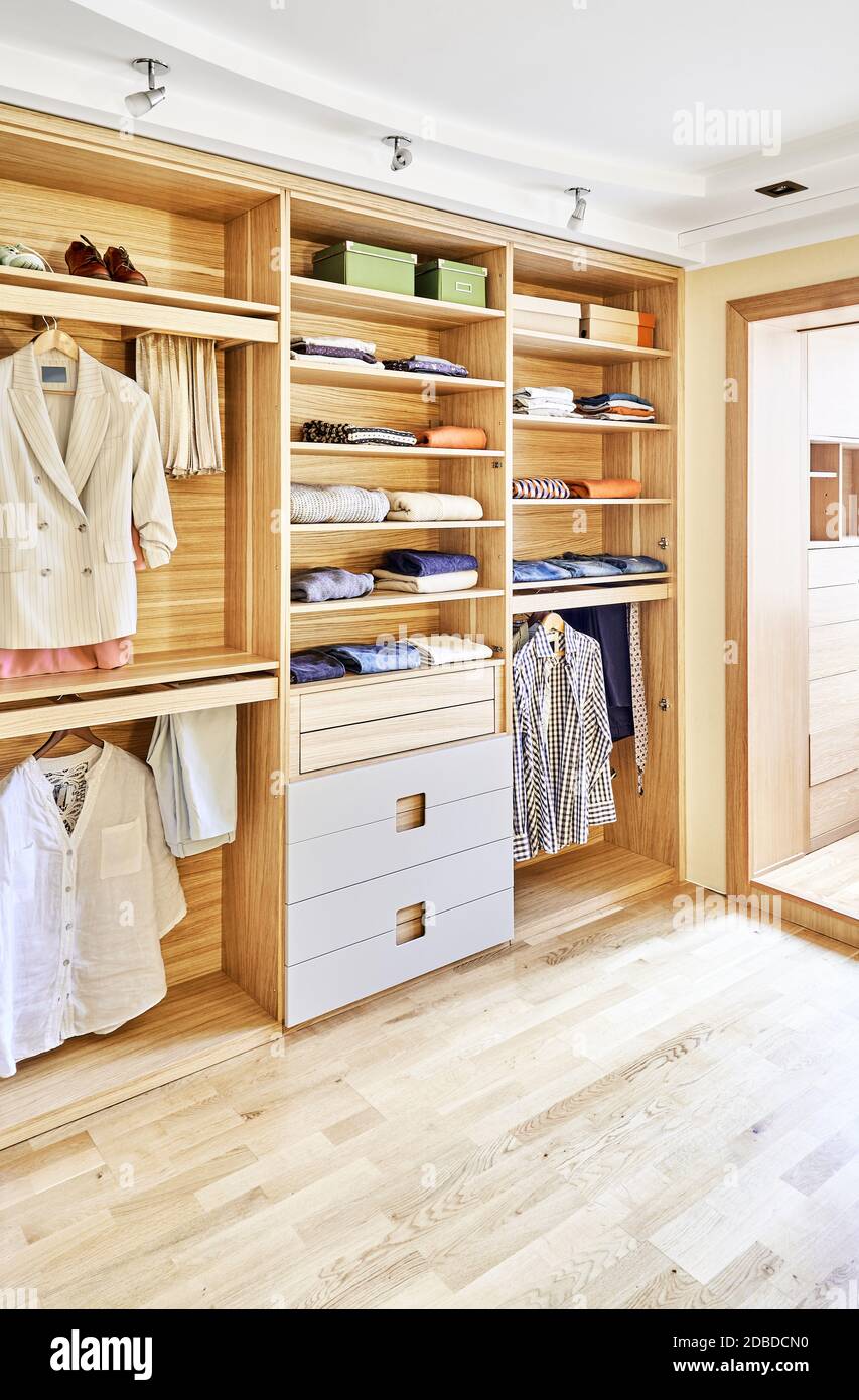 Internal details of the wooden wardrobe with slide out rack for ...