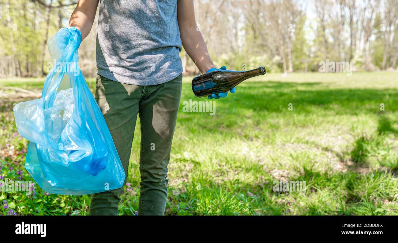 help the planet by cleaning nature from garbage Stock Photo - Alamy