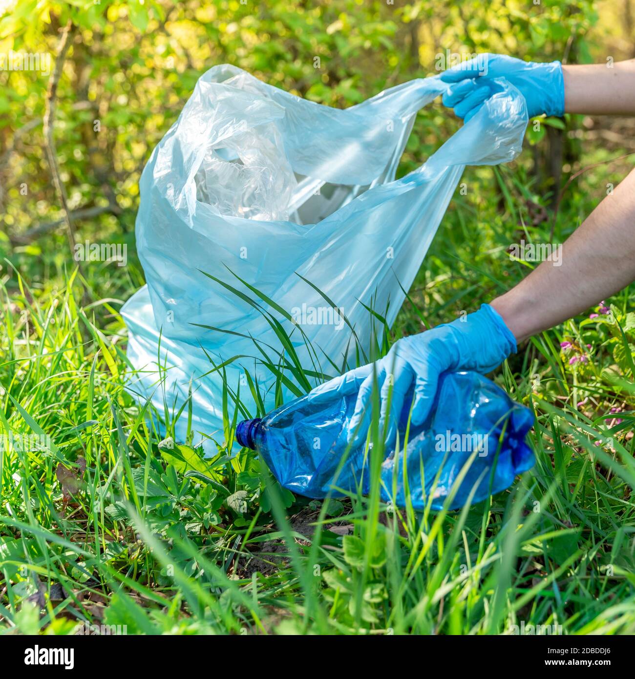 global pollution of the planet with plastic waste. Volunteers help ...