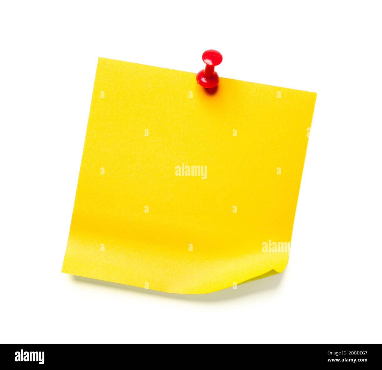 Yellow sticker pinned red pushbutton with curled corner on white ...