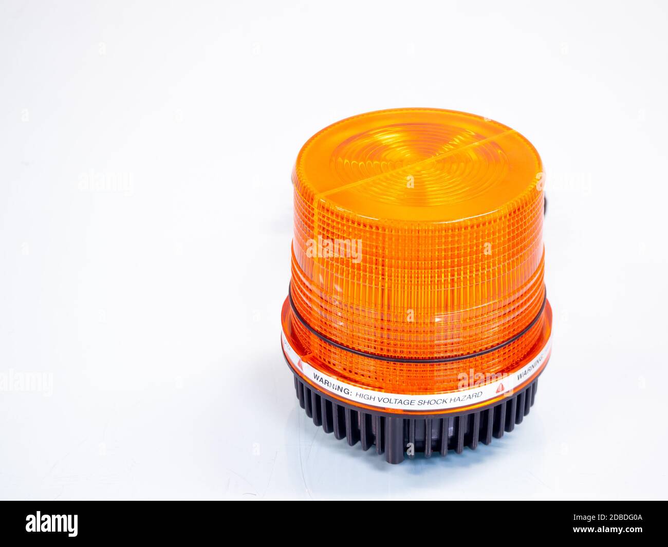 the Orange rotating beacon on white reflective background Stock Photo ...
