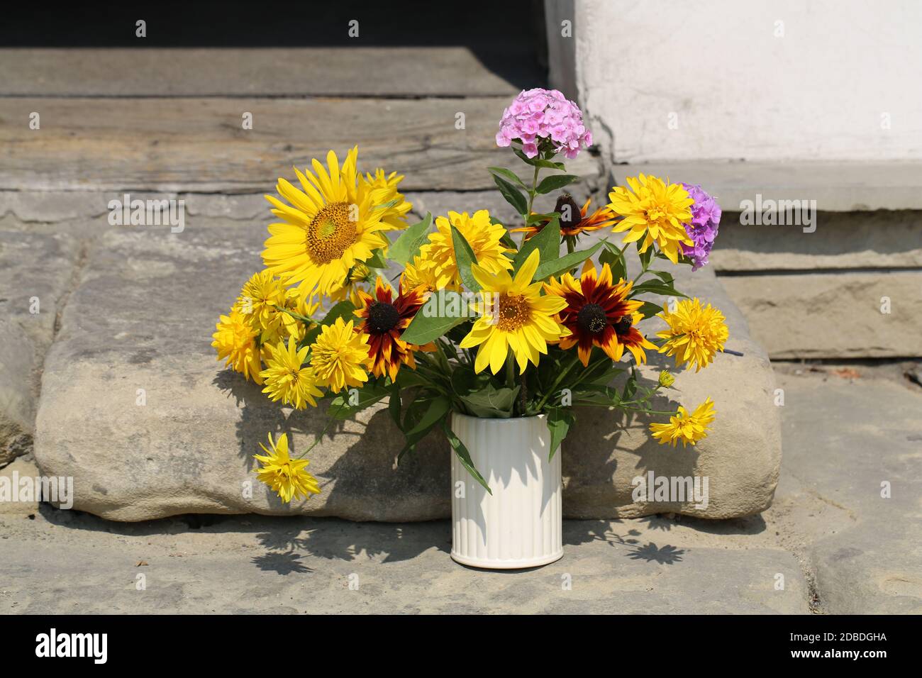 the beautiful bouquet from sunflowers, hydrangeas and chrysanthemums ...