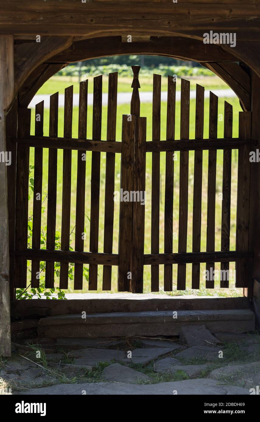 Closed wooden gate to the garden house Stock Photo - Alamy