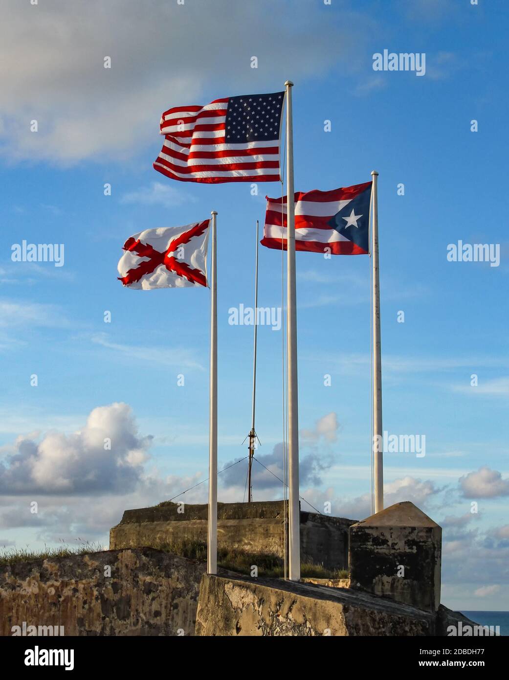 The three flags that fly at El Morro in Old San Juan, Puerto Rico ...