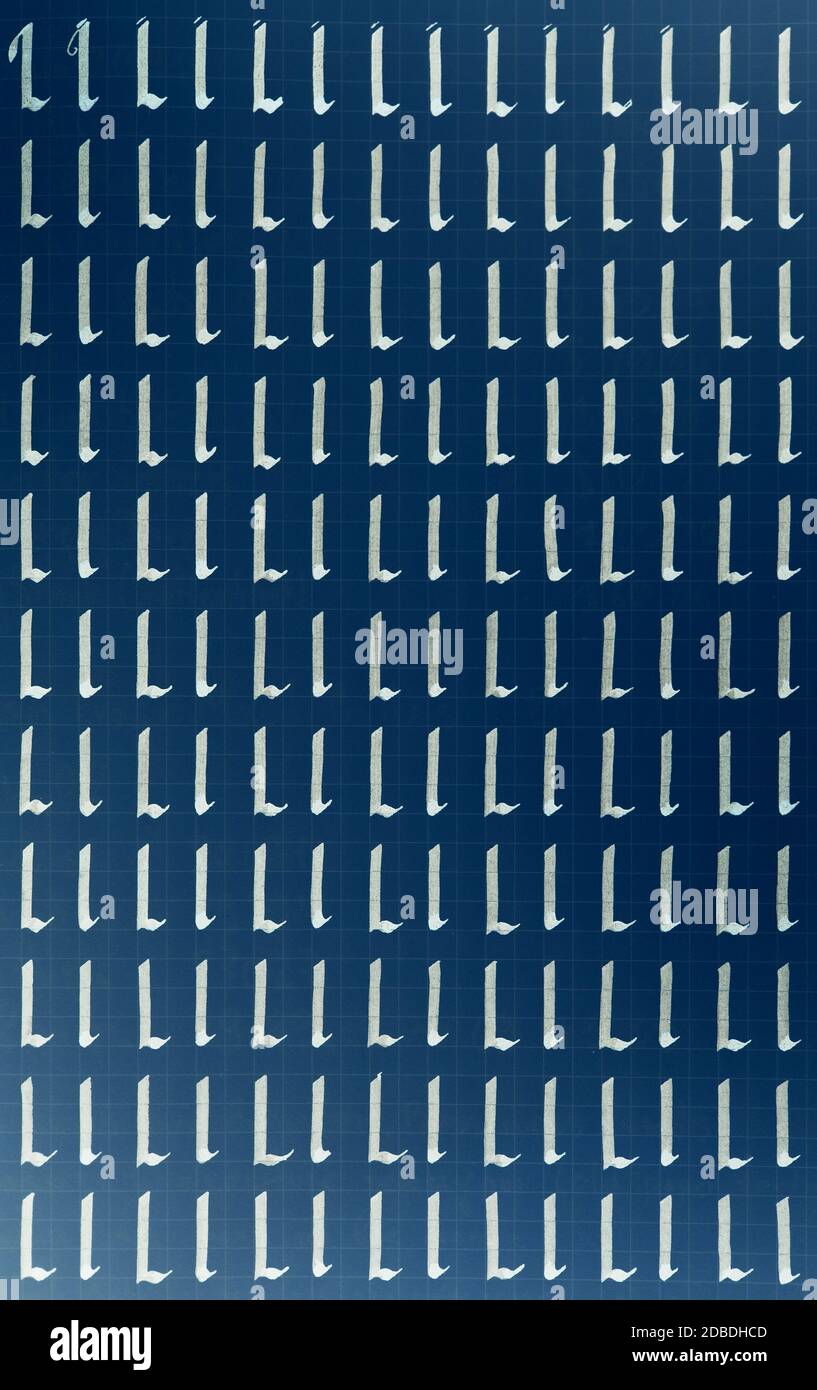 Calligraphic white on dark blue letter L learning skills paper page ...