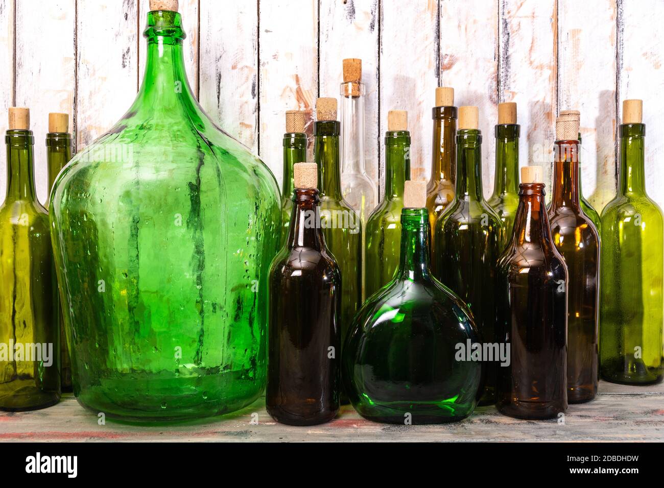 glass wine bottles of different sizes Stock Photo - Alamy