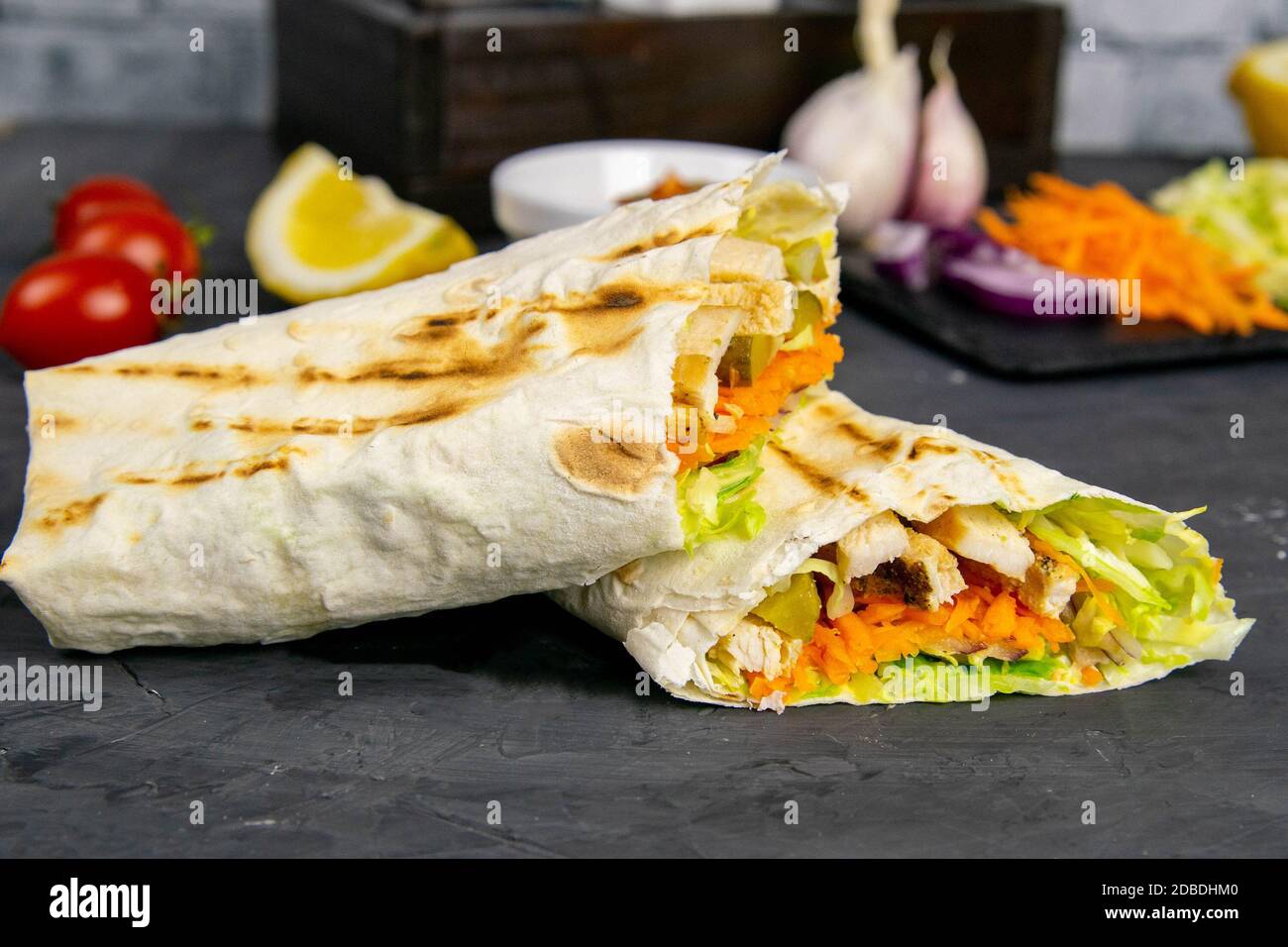 Homemade shawarma, burrito, chicken roll with vegetables and sauce. Top ...