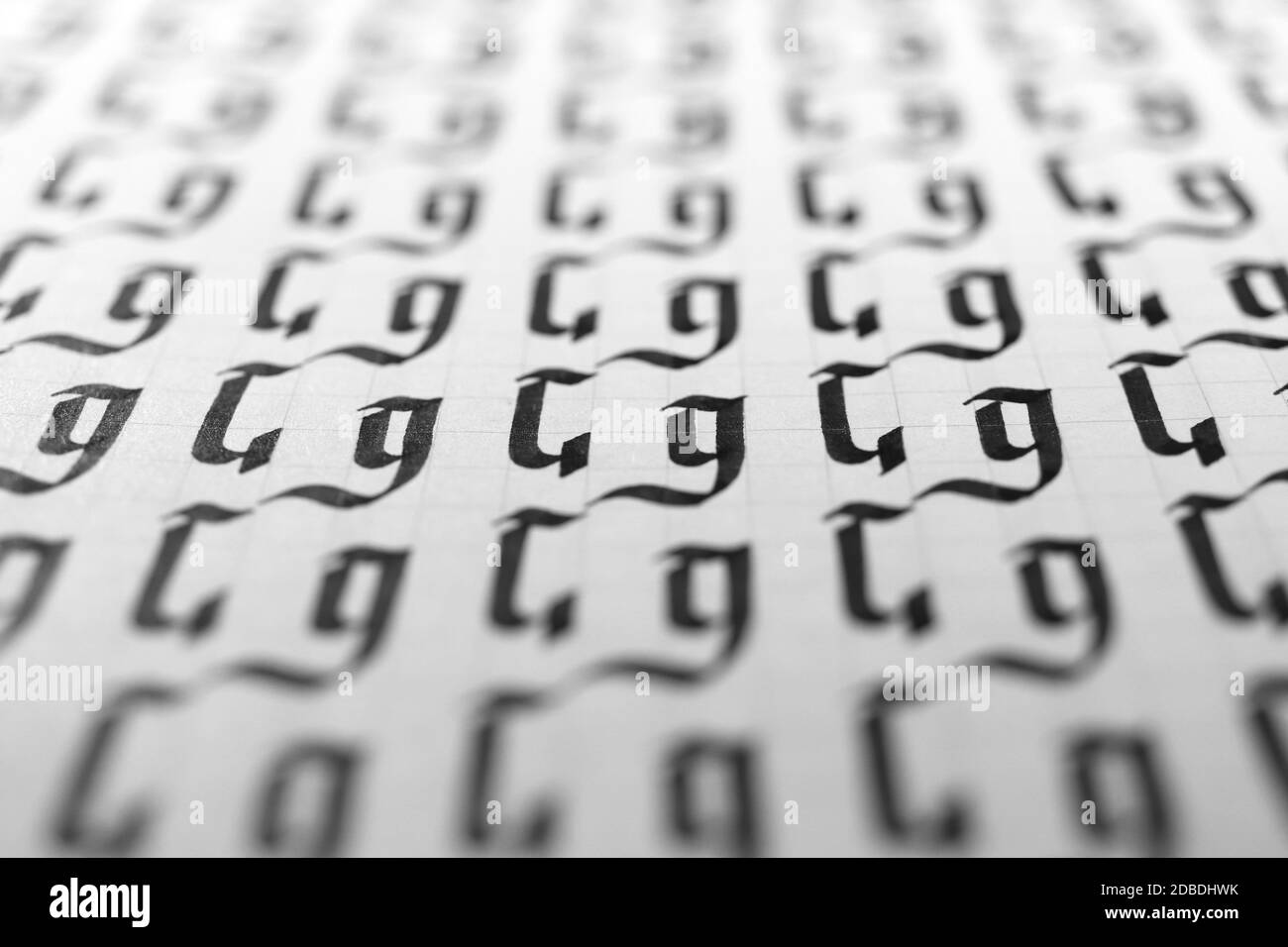 Calligraphy black and white letters G background. Lettering practice ...