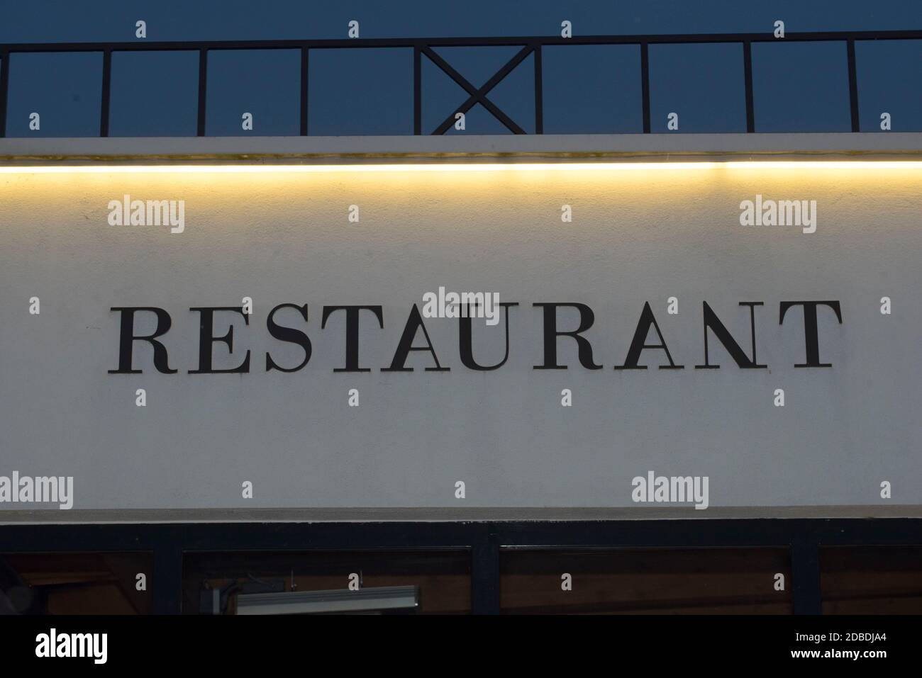 restaurant sign on a building Stock Photo - Alamy